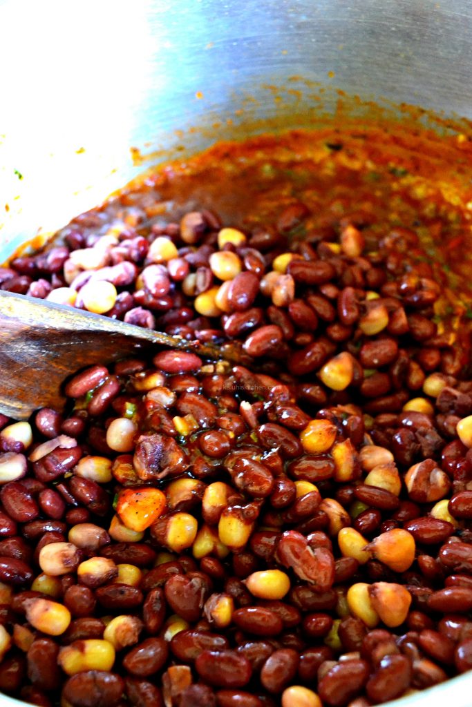 add the cooked maize and beans into the cooked down tomato stew_how to ...